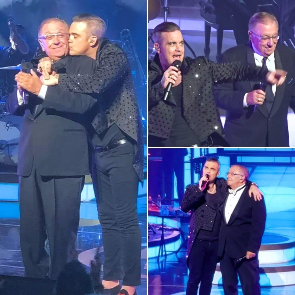 In a heartwarming moment, Robbie Williams shared the stage with his ...